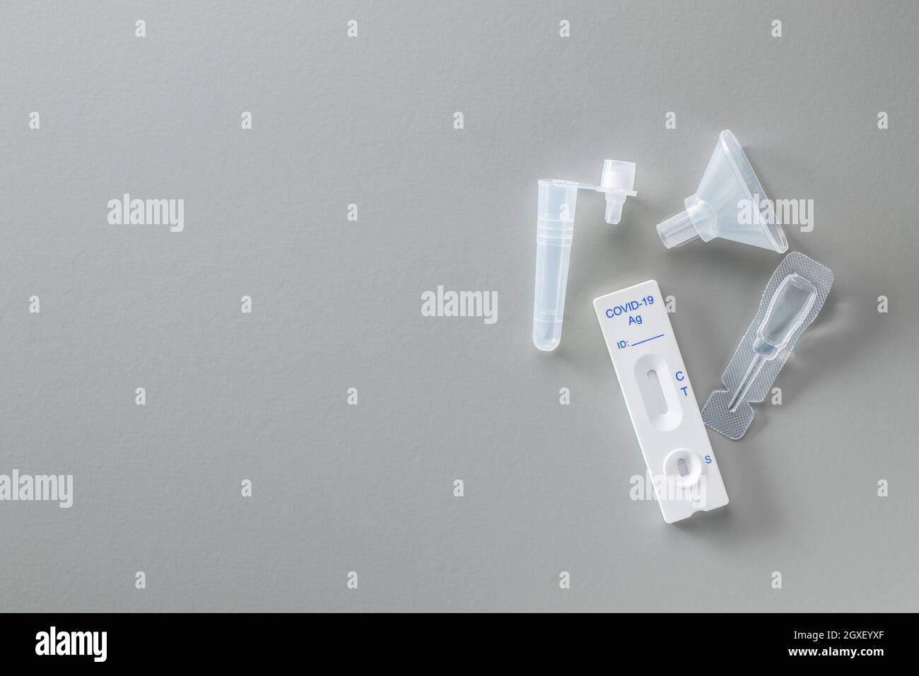Covid-19 rapid antigen test. Rapid antibodies test kit on grey ...