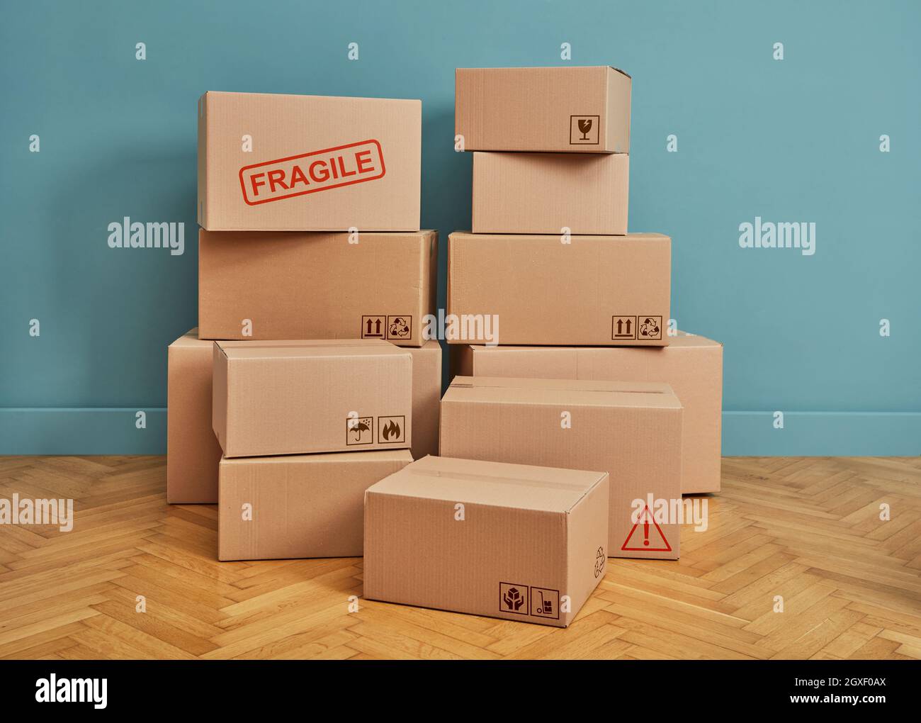 Cardboard boxes in room Stock Photo - Alamy