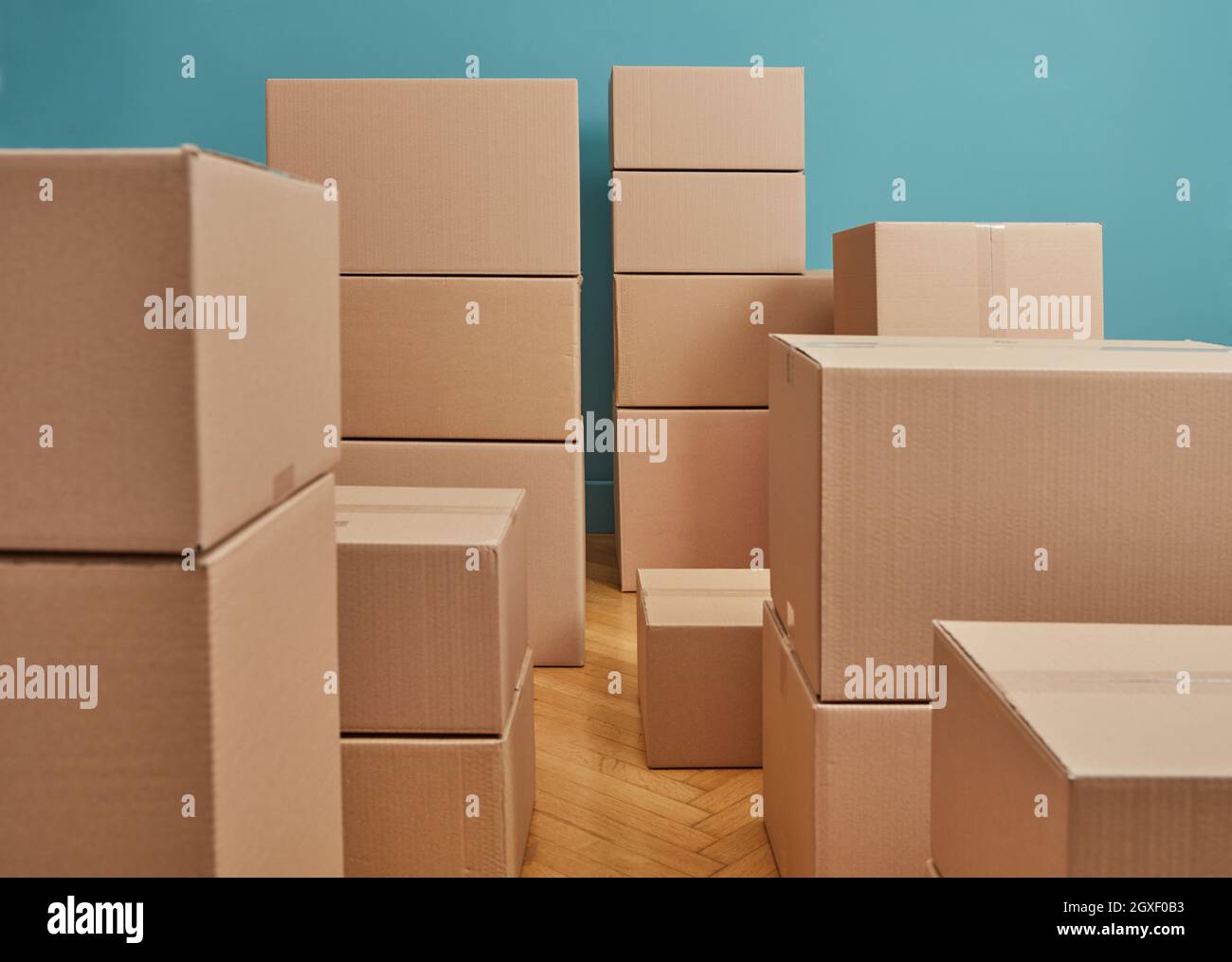 Cardboard boxes in room Stock Photo - Alamy