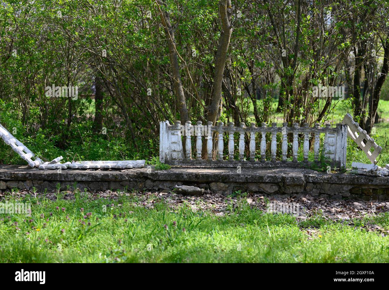 broken concrete decorative fence in a public park, vandalism Stock ...