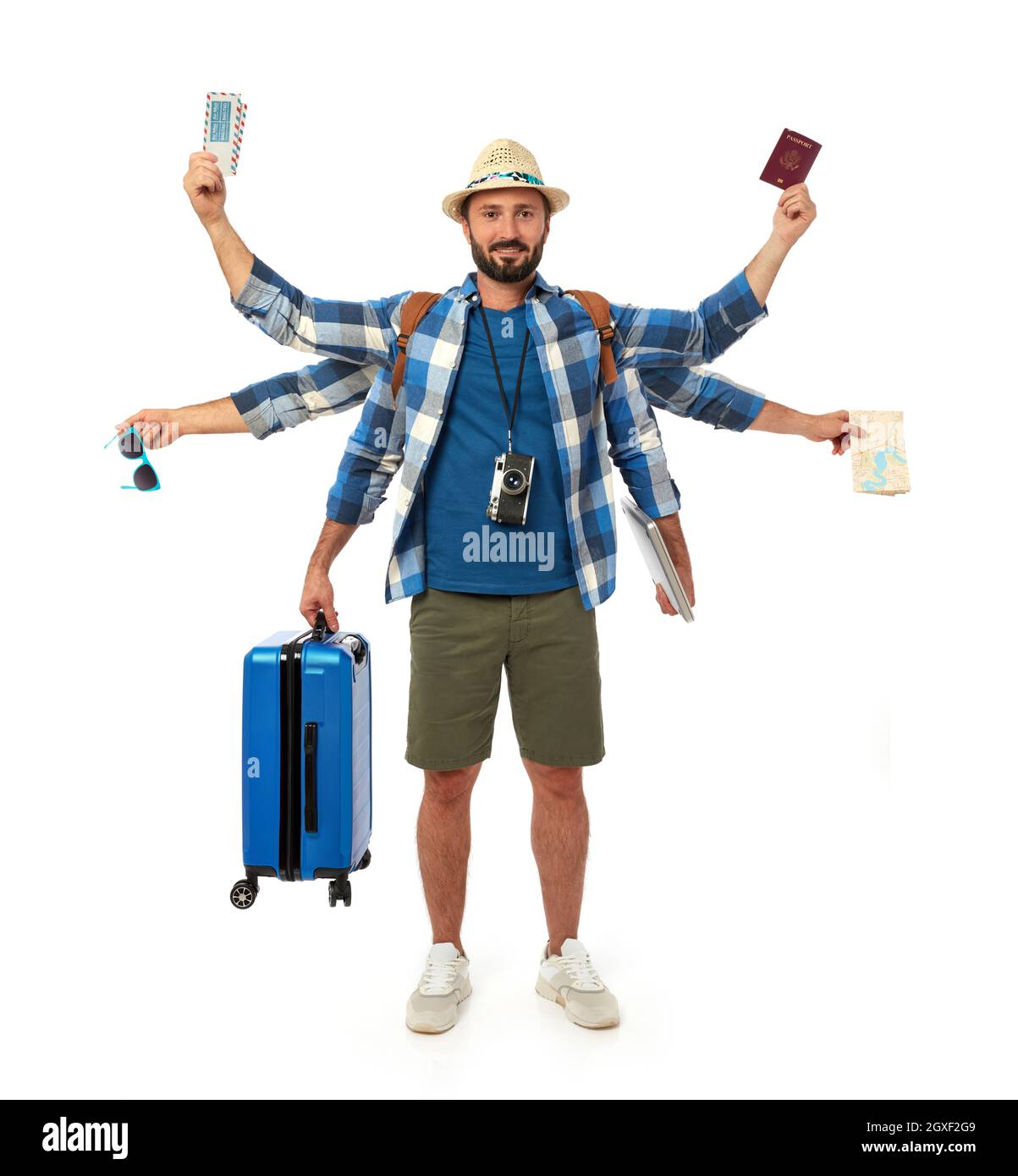 A man multitasking with several arms holding items Stock Photo - Alamy