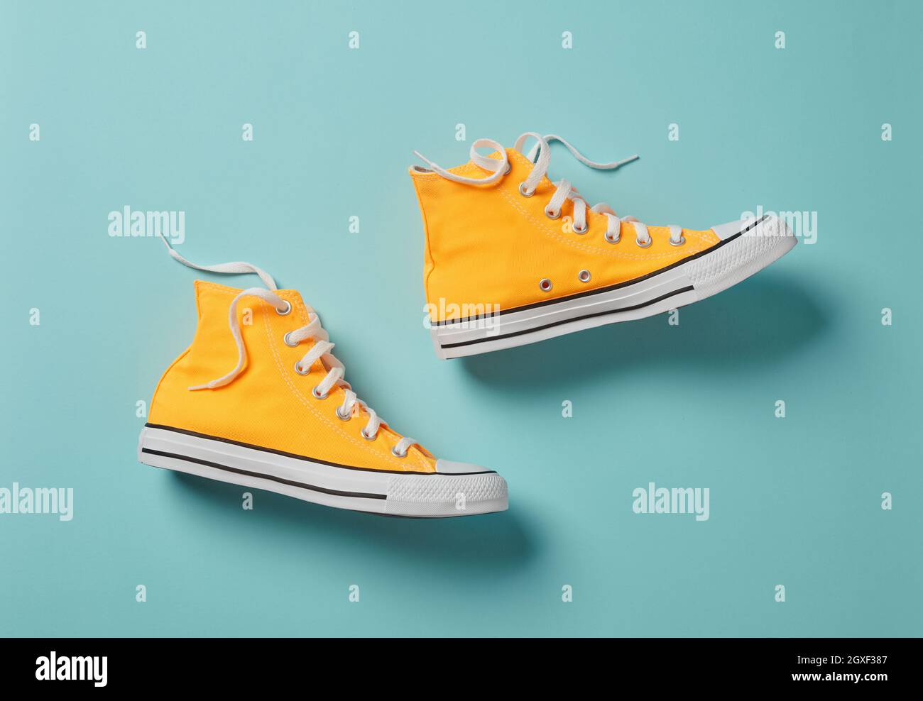 Yellow walking shoes hi-res stock photography and images - Alamy