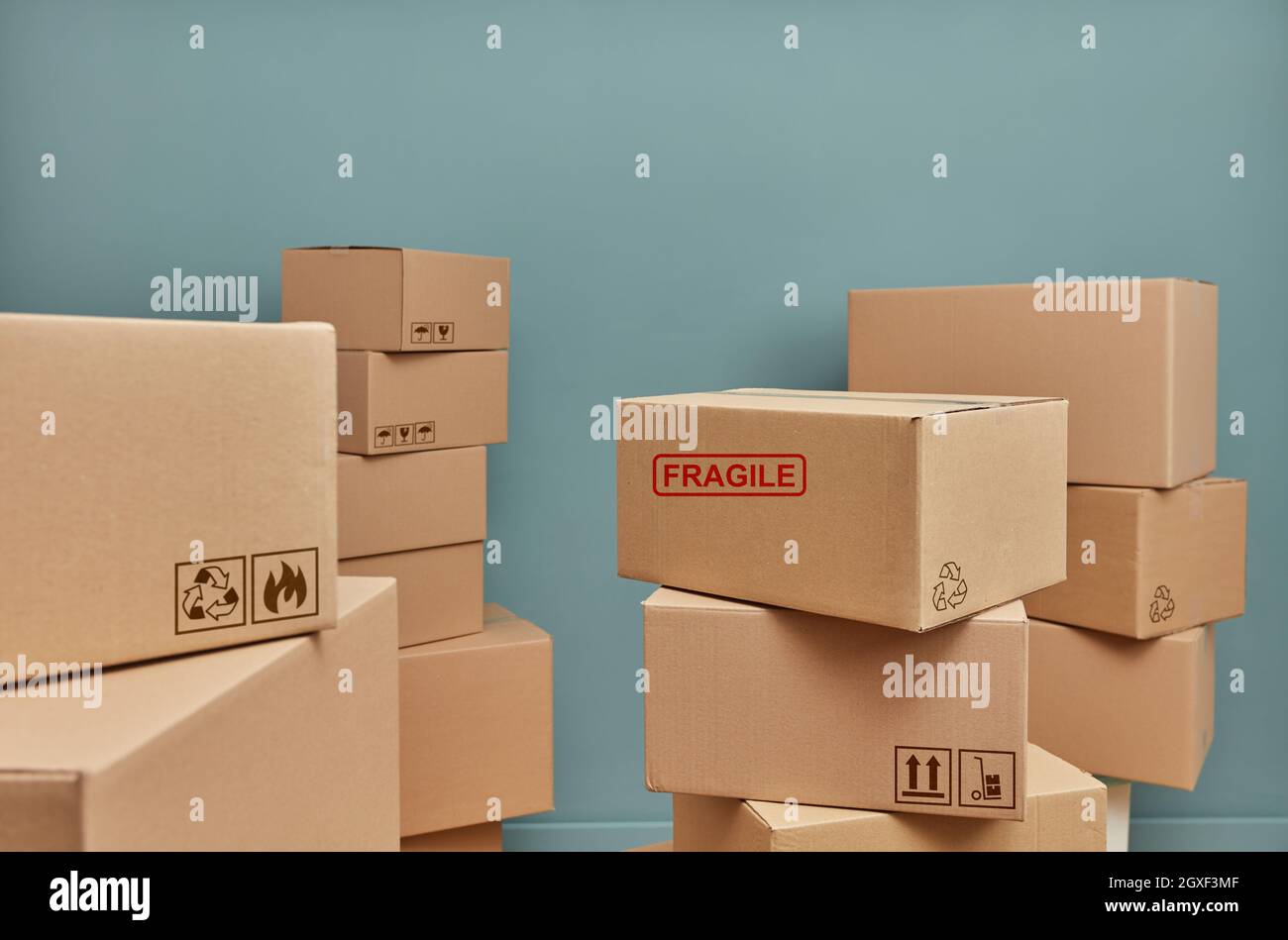 Cardboard boxes in room Stock Photo - Alamy