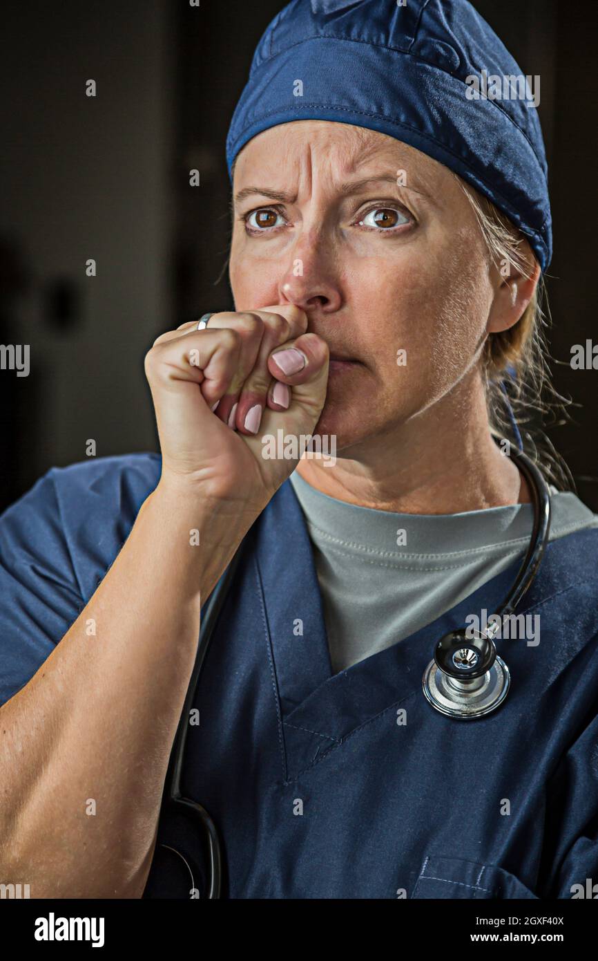 Very Concerned Looking Female Doctor or Nurse Stock Photo - Alamy