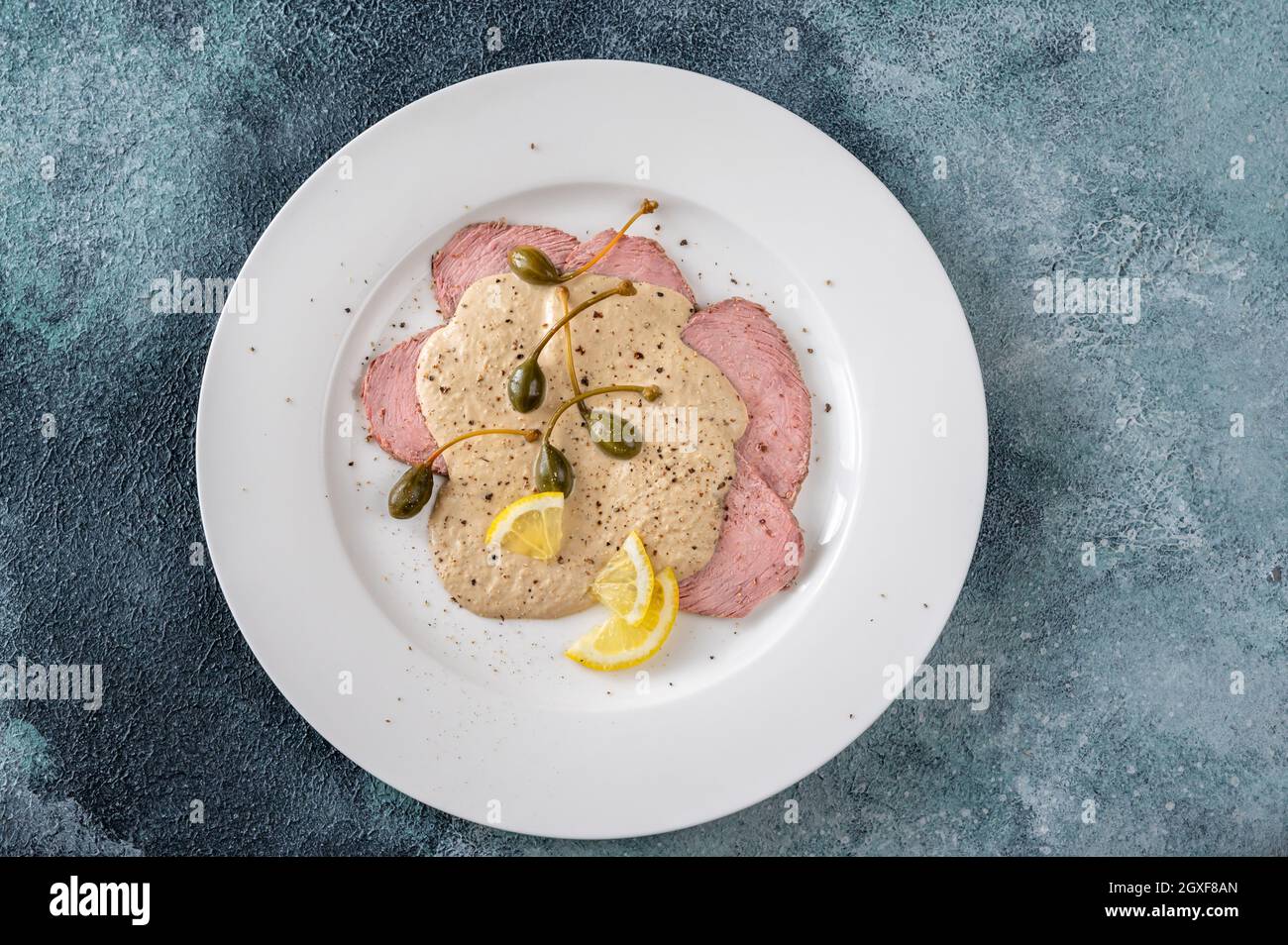 Vitello tonnato - Italian dish of cold, sliced veal Stock Photo - Alamy