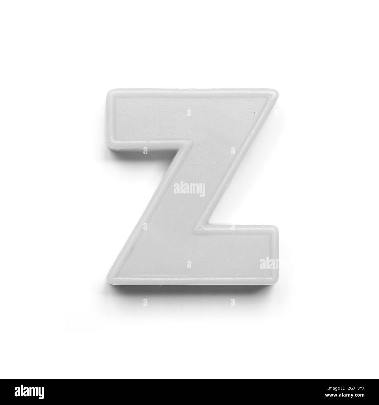 Magnetic lowercase letter Z of the British alphabet in black and white ...