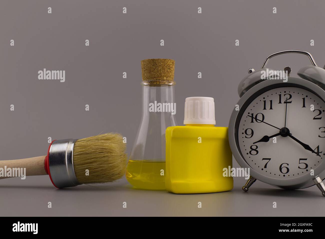 DIY, decorating or renovations concept with a still life of an alarm ...