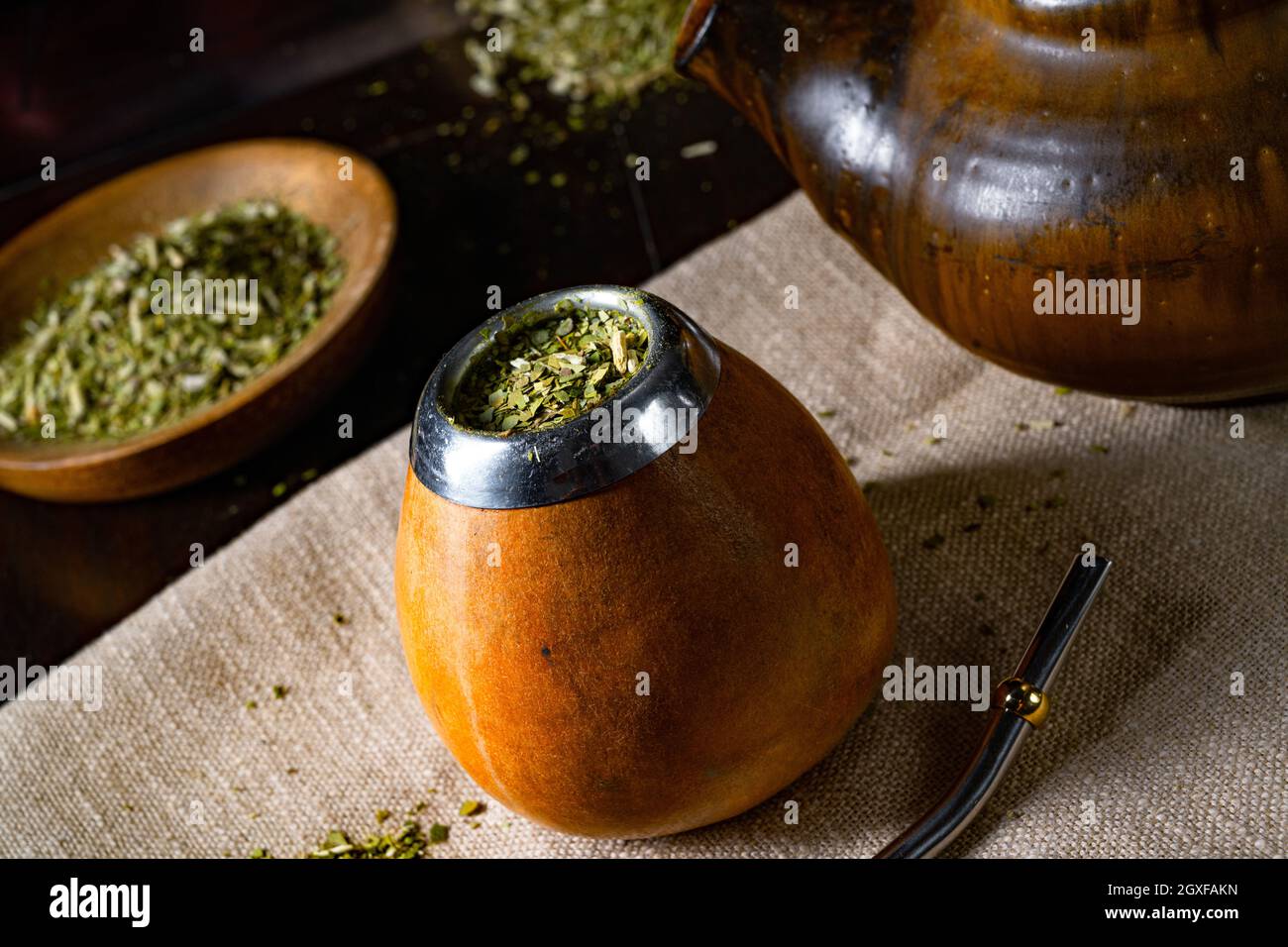 Prepare yerba mate with calabash and bombilla Stock Photo - Alamy