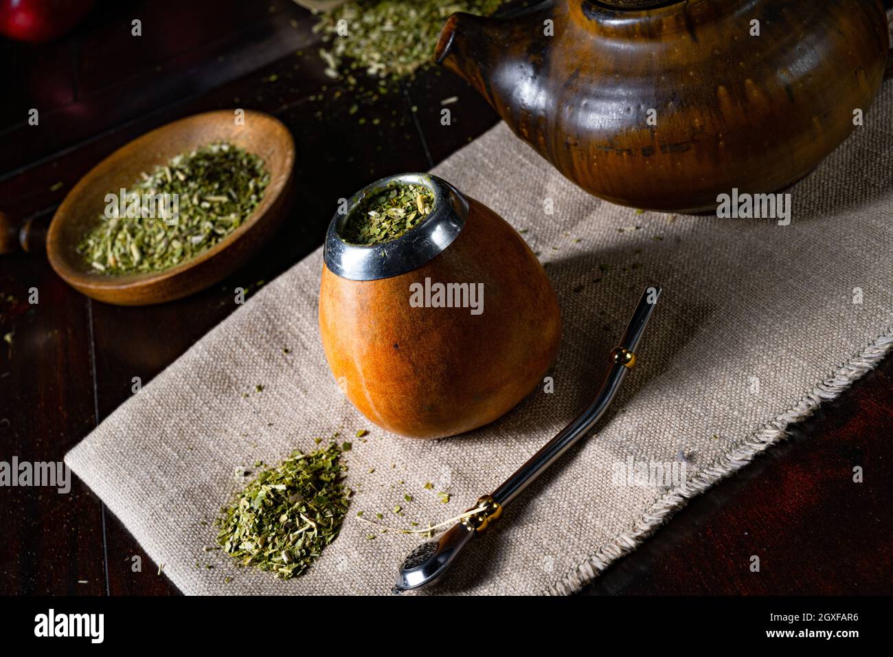 Prepare yerba mate with calabash and bombilla Stock Photo - Alamy