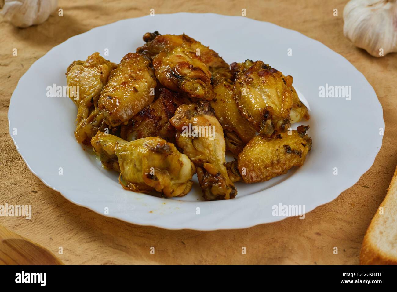 Garlic Chicken Wings (Pollo al ajillo). Spanish Tapa dish served with ...