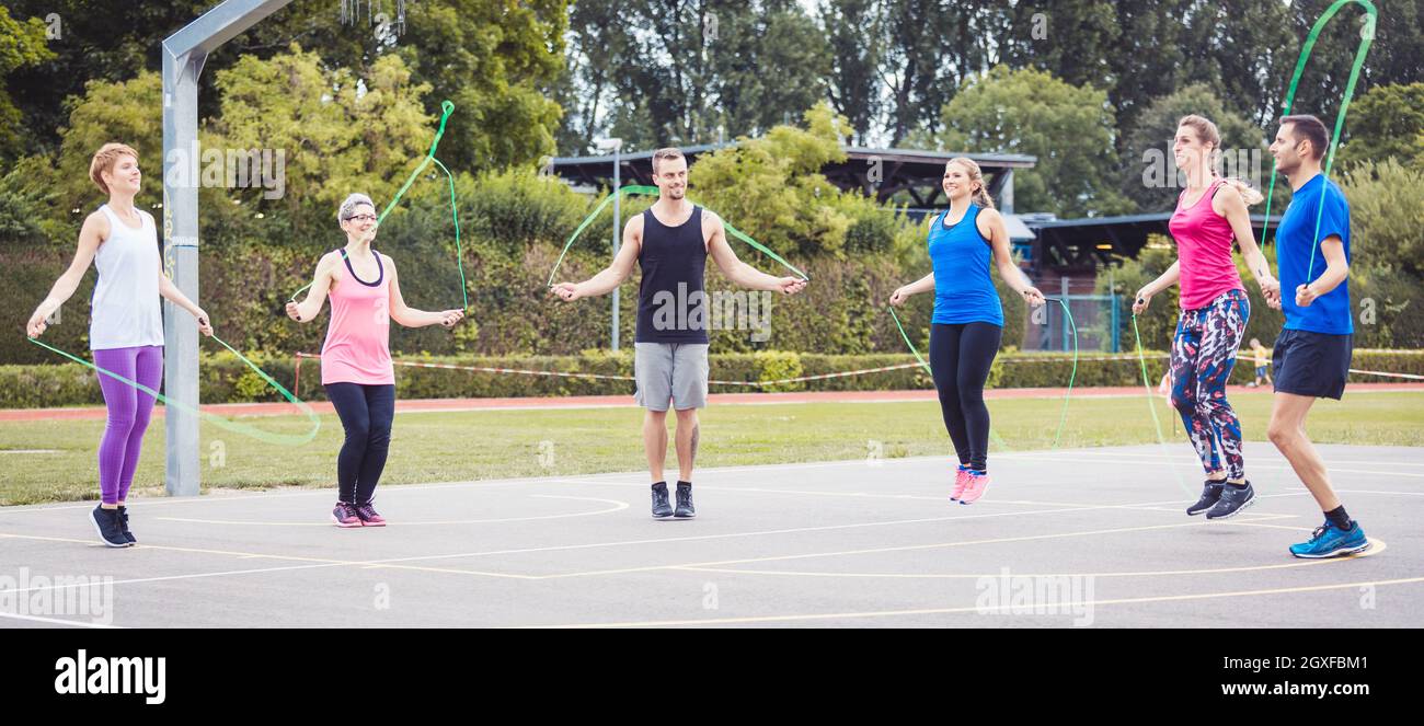 Group jumping skipping rope hi-res stock photography and images - Alamy