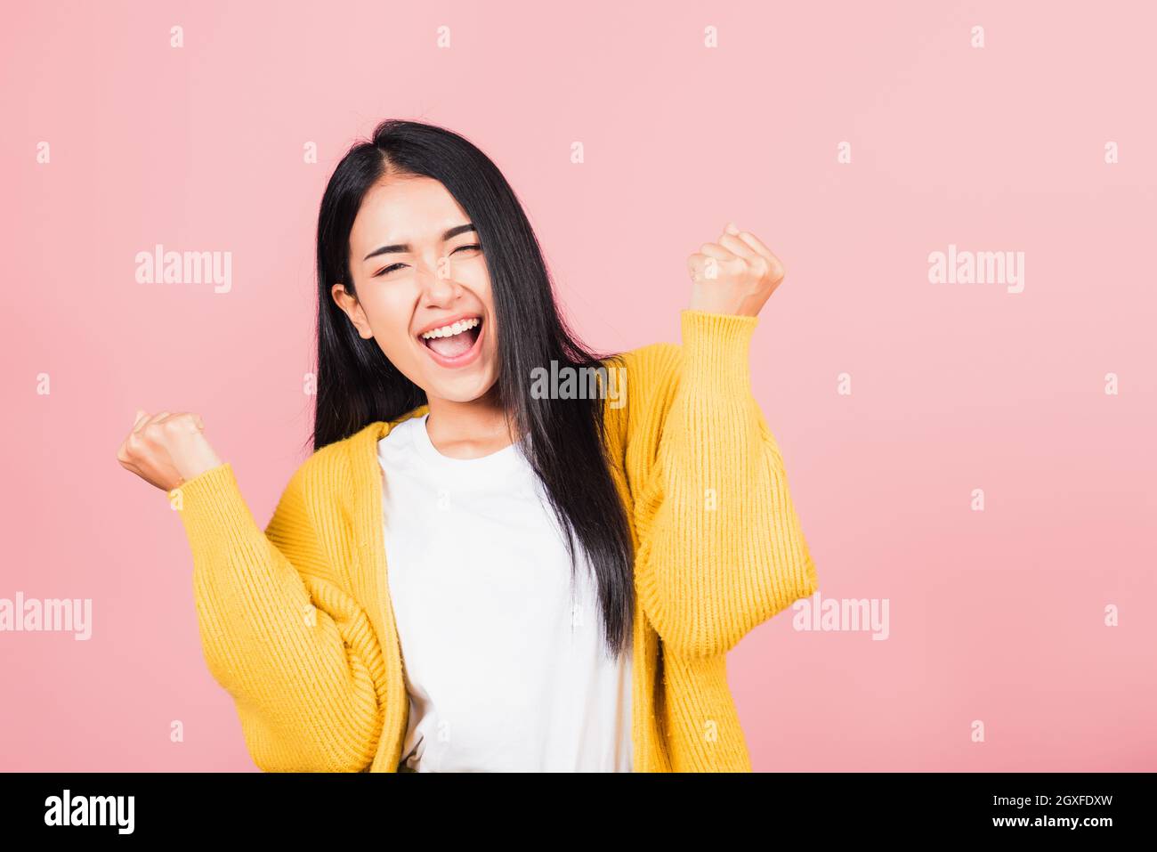 Happy Asian portrait beautiful cute young woman standing winning and ...