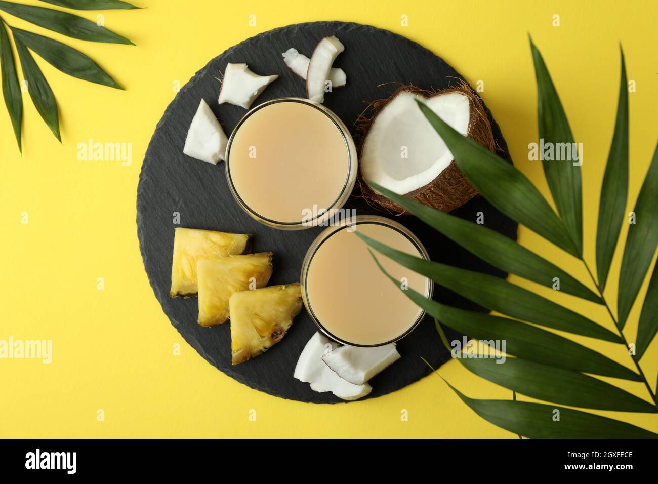 Pina colada cocktails and ingredients on yellow background Stock Photo ...