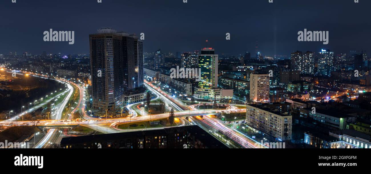 Aerial panoramic drone above roof view of Kiev night traffic road ...