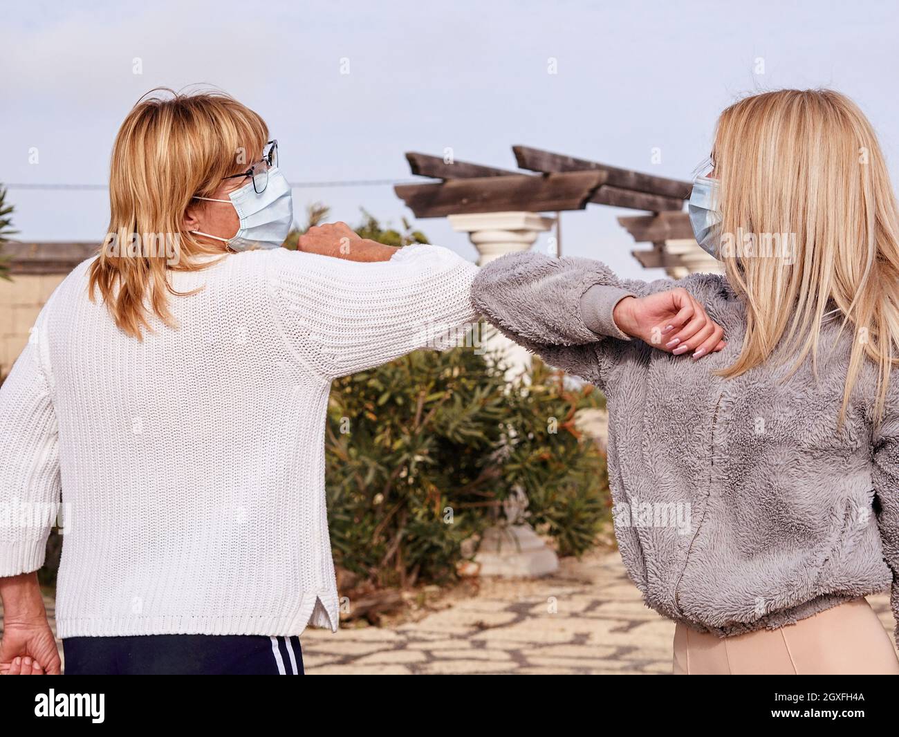 Two women greeting each other hi-res stock photography and images - Alamy