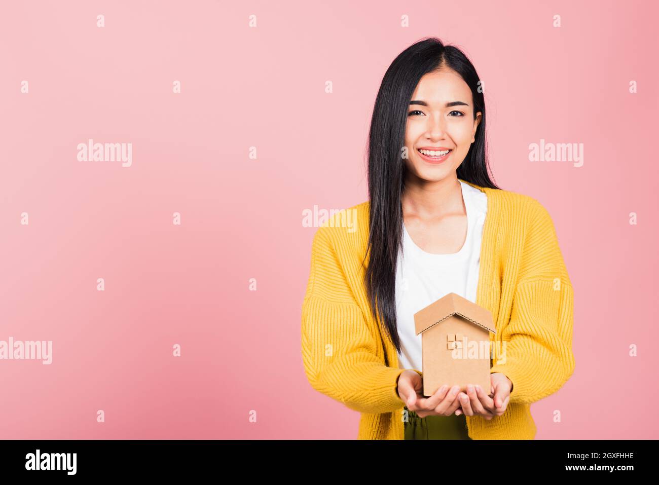 Happy Asian portrait beautiful cute young woman excited smiling holding ...