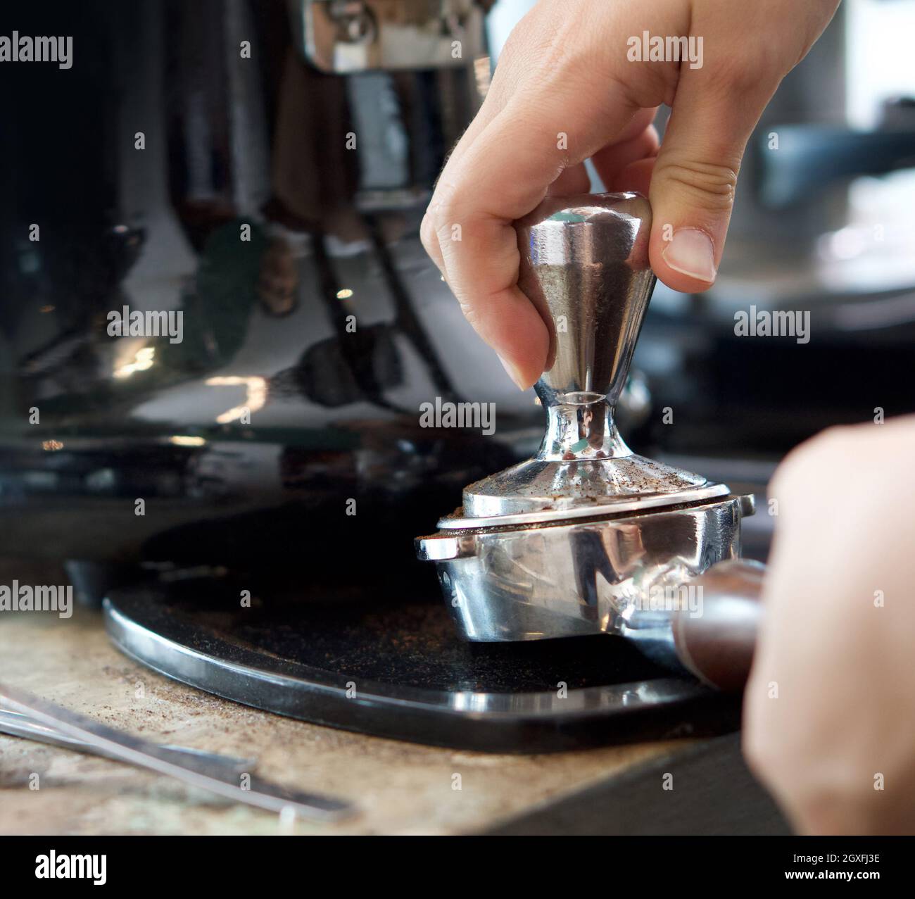 Barista making fresh espresso coffee. Espresso Machine Portafilters ...