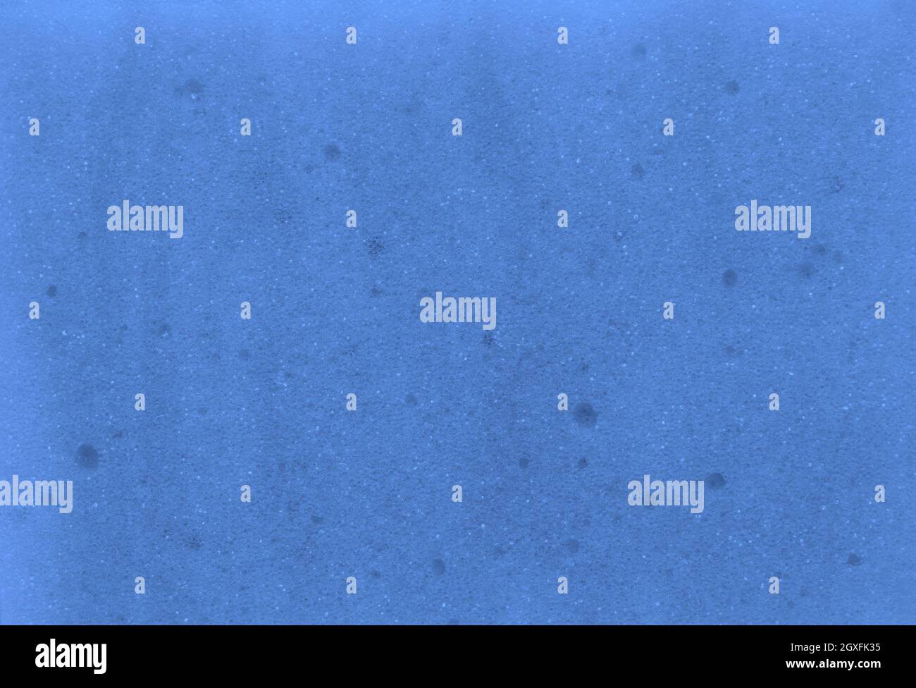 The texture of a blue sponge for washing Stock Photo - Alamy