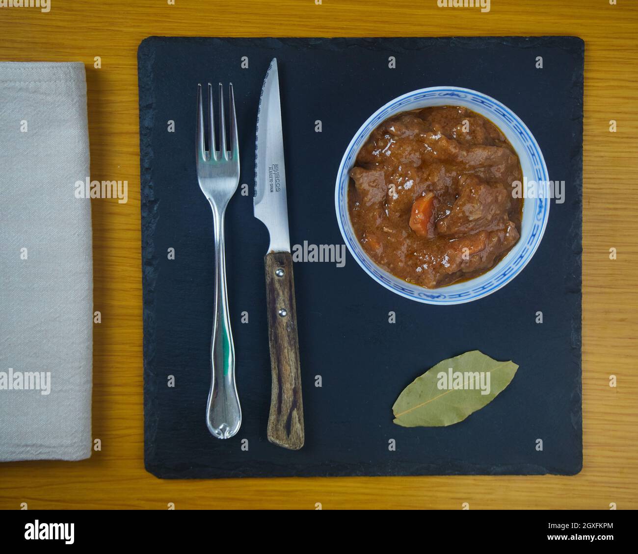 Fricando, Traditional Catalan tapa, stew of beef in a bowl decorated ...