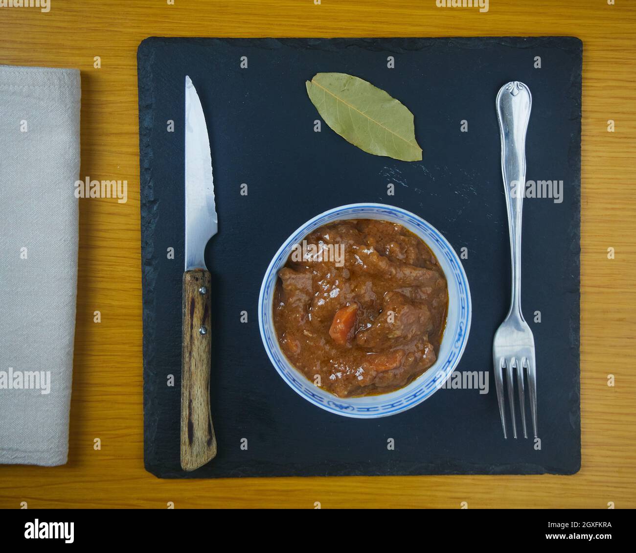 Fricando, Traditional Catalan tapa, stew of beef in a bowl decorated ...