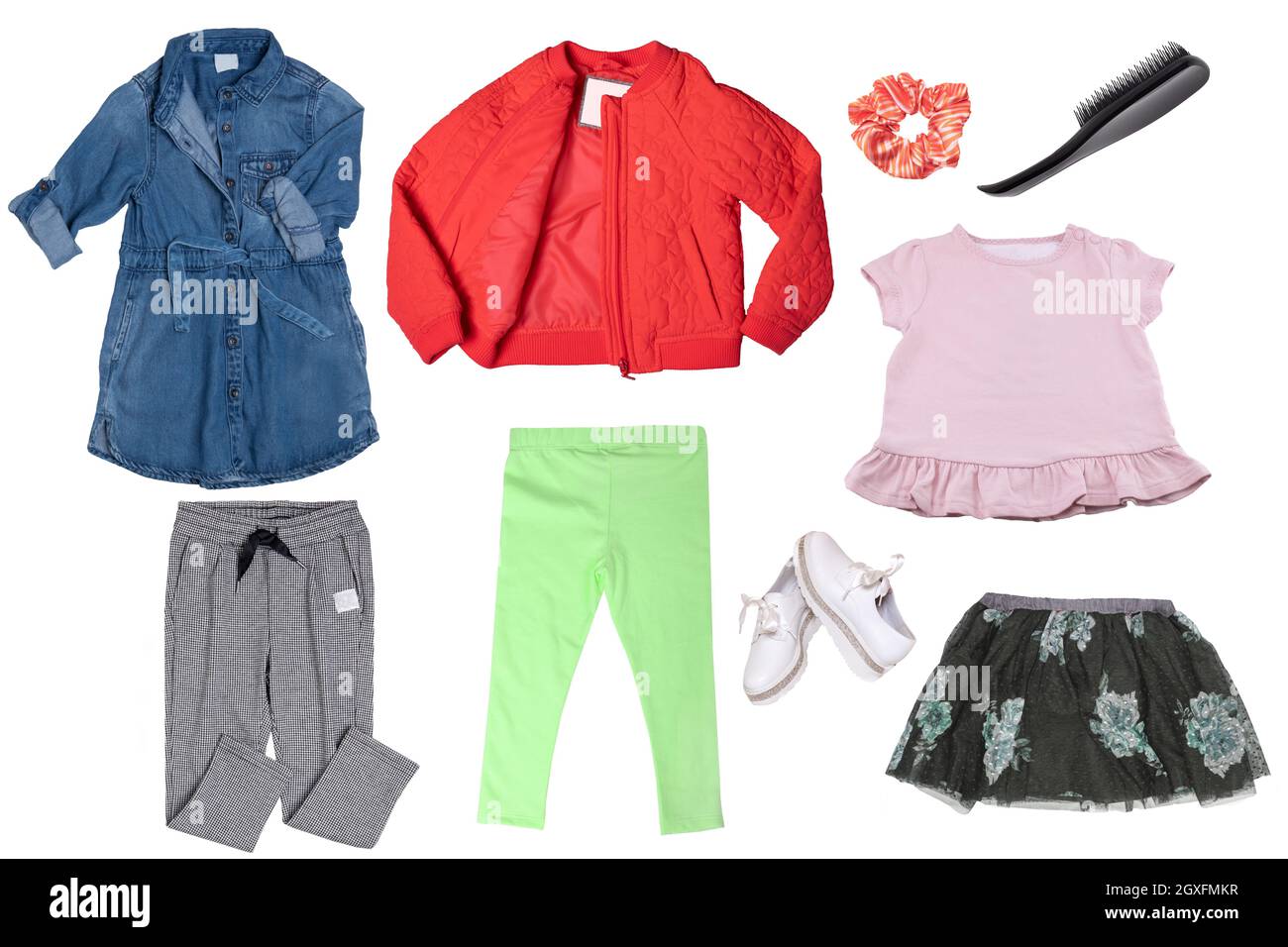 Collage set of little girl clothes isolated on a white background. The ...