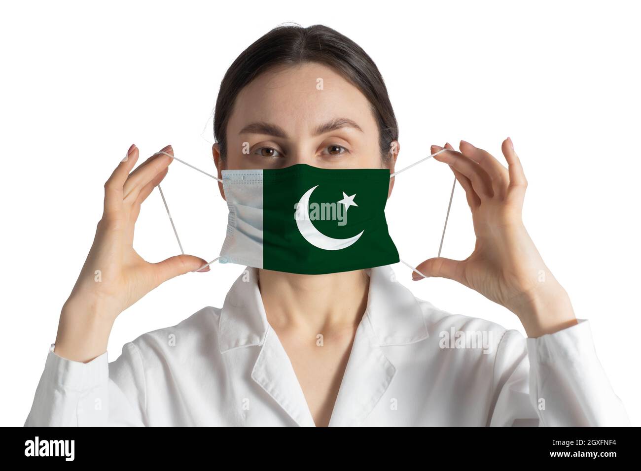 Respirator with flag of Pakistan Doctor puts on medical face mask ...
