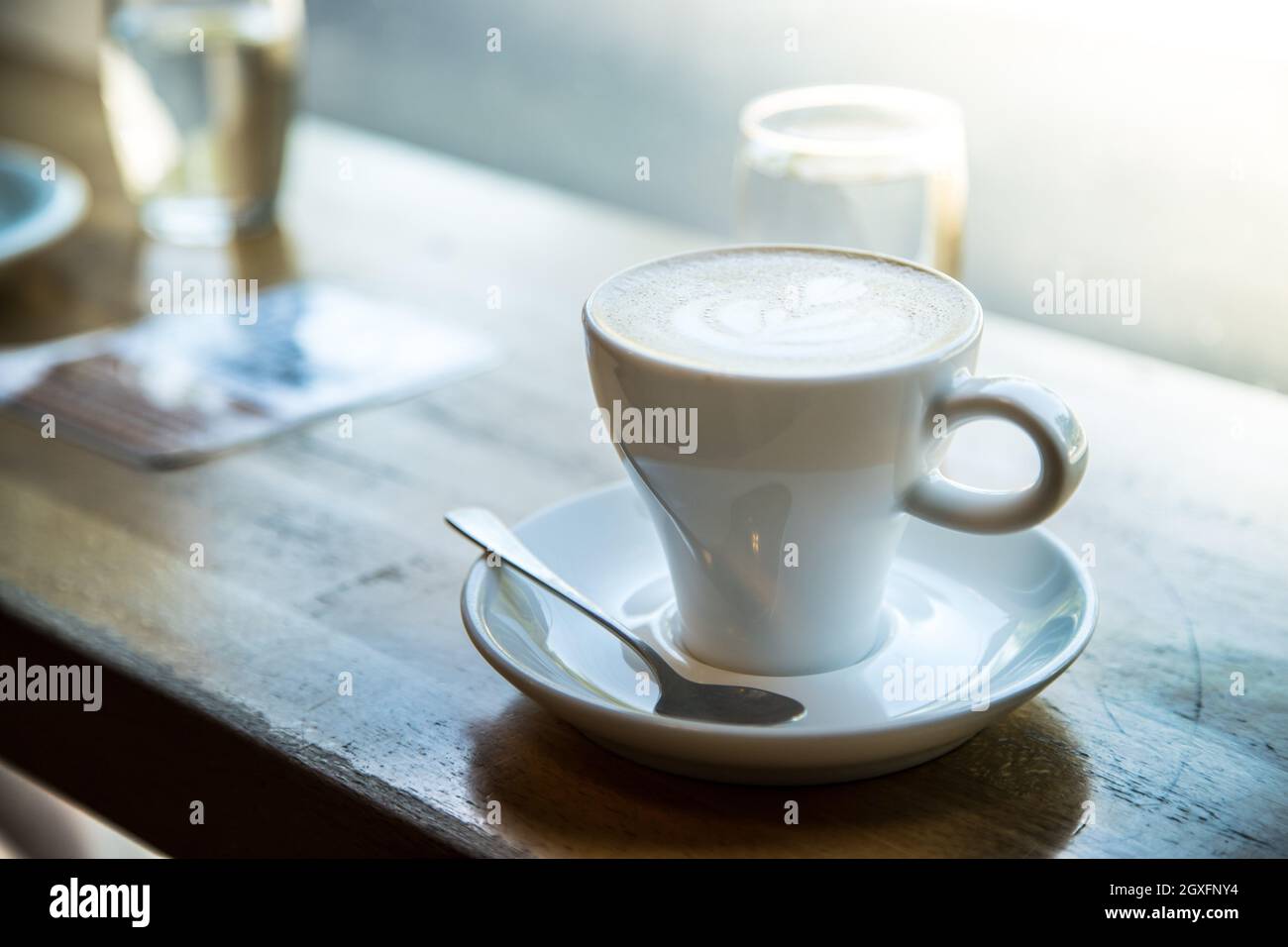 Cup of fresh brewed cappuccino in an Italian café Stock Photo - Alamy