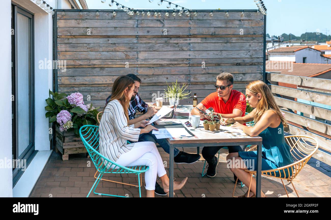 People sitting office terrace hi-res stock photography and images - Alamy