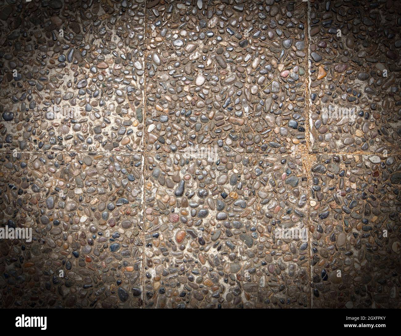 The Ground stone washed floor, made of small sand stone in light Stock ...