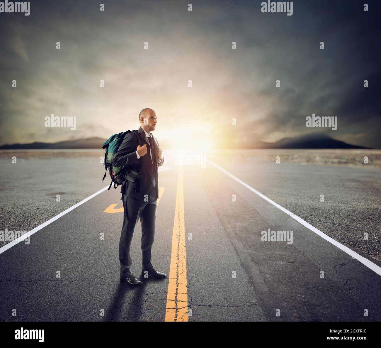 Businessman like an explorer in a long street. Concept of future and ...