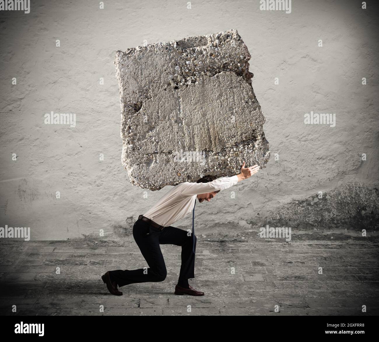 Businessman walking with a heavy boulder on his back Stock Photo - Alamy