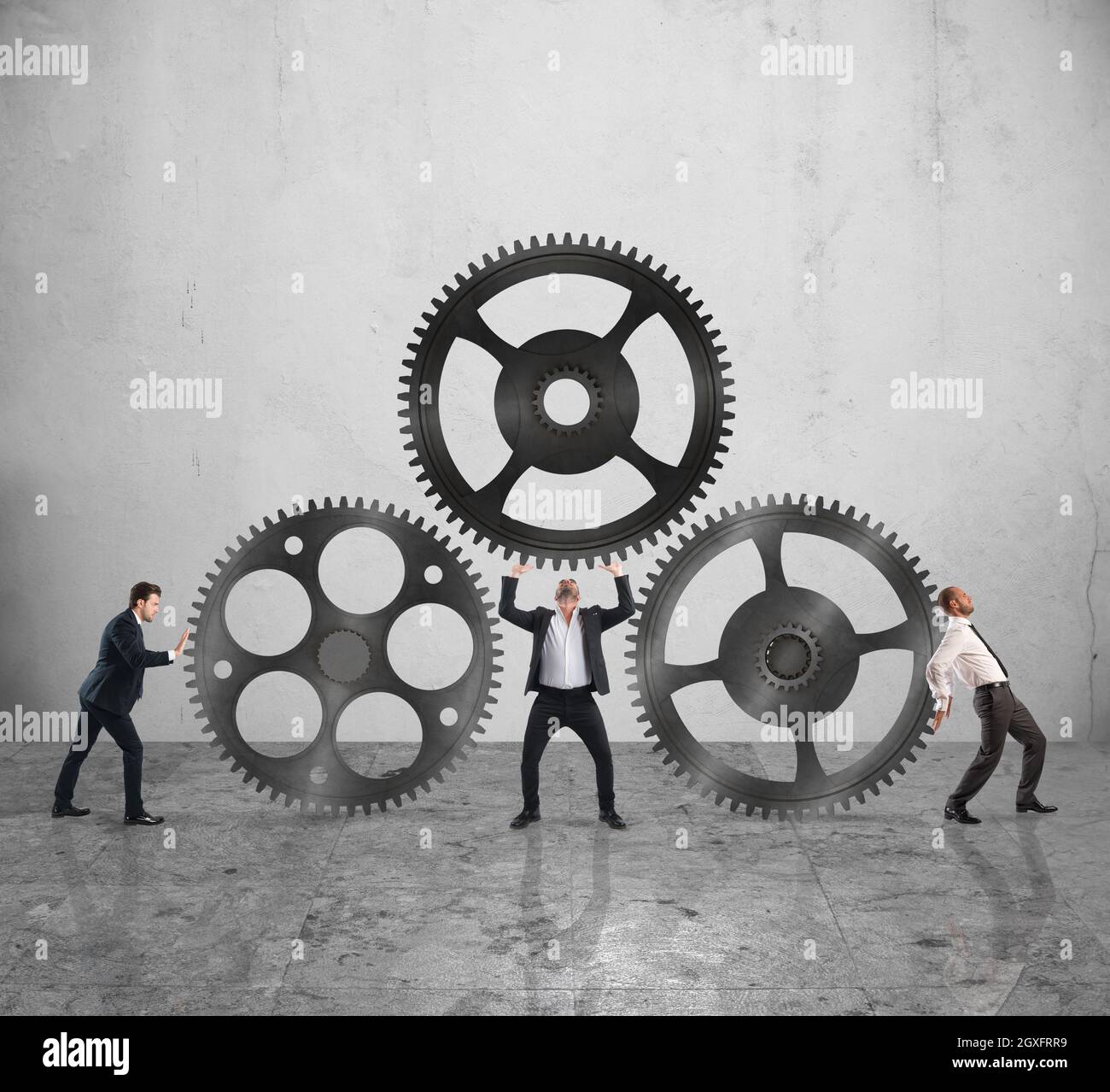 Teamwork of businesspeople work together to a system of gears Stock ...