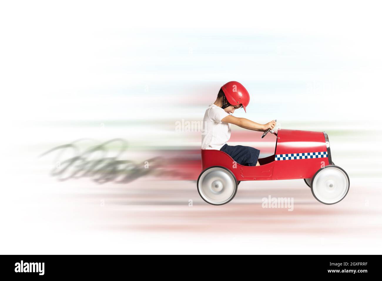 Boy child play and runs with toy car Stock Photo - Alamy