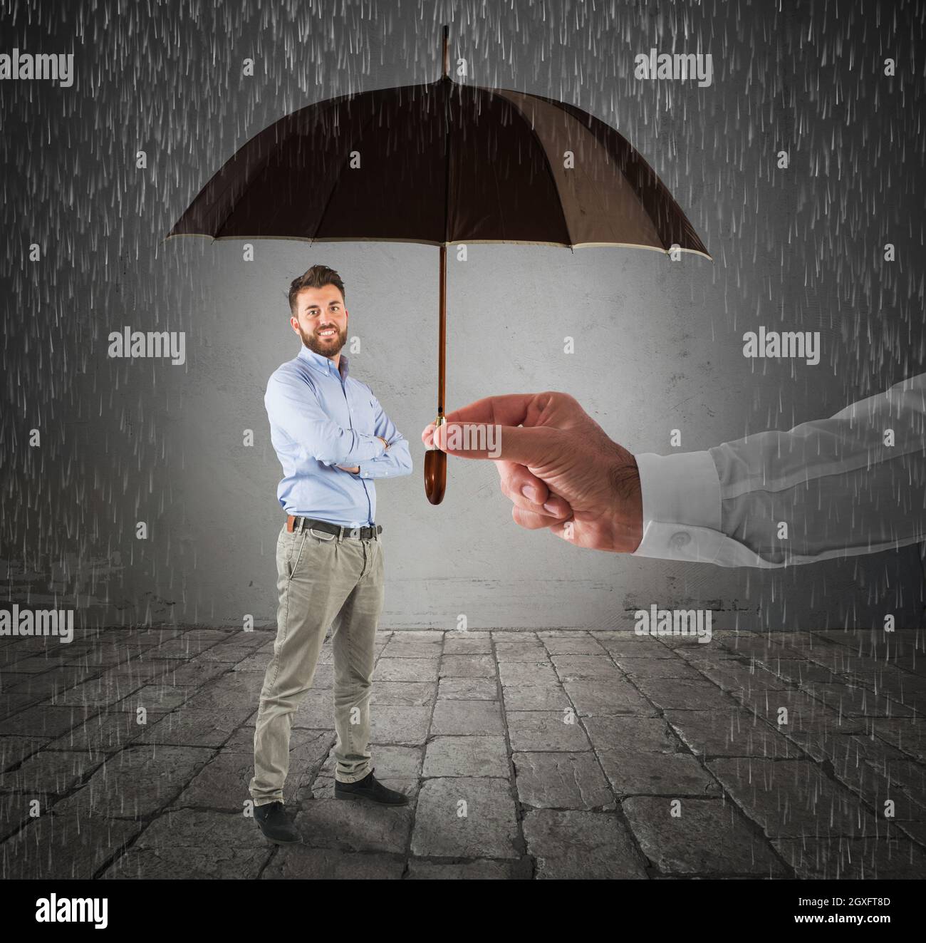 Man covered by an umbrella of person Stock Photo - Alamy