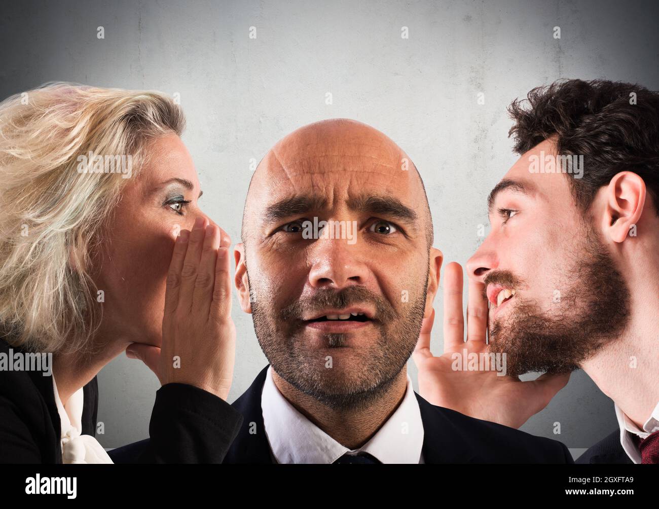 Man and woman talking to man ear Stock Photo - Alamy