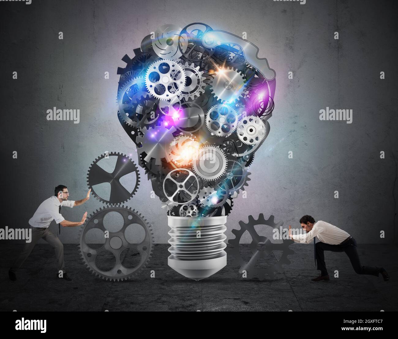 Business team push gears towards a great light bulb. build an idea ...