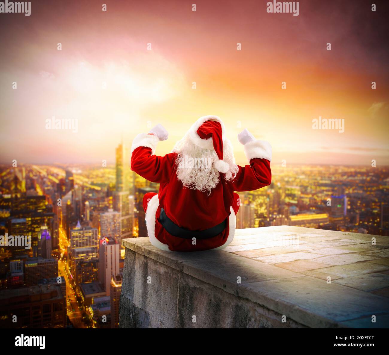 Santa Claus on a roof view city at dawn Stock Photo - Alamy