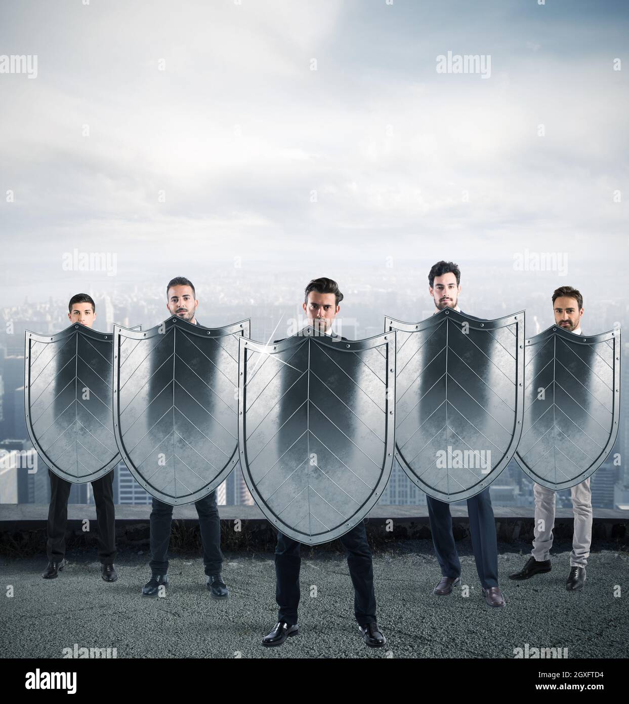 Businessmen with shields. concept of protection and defense in the ...
