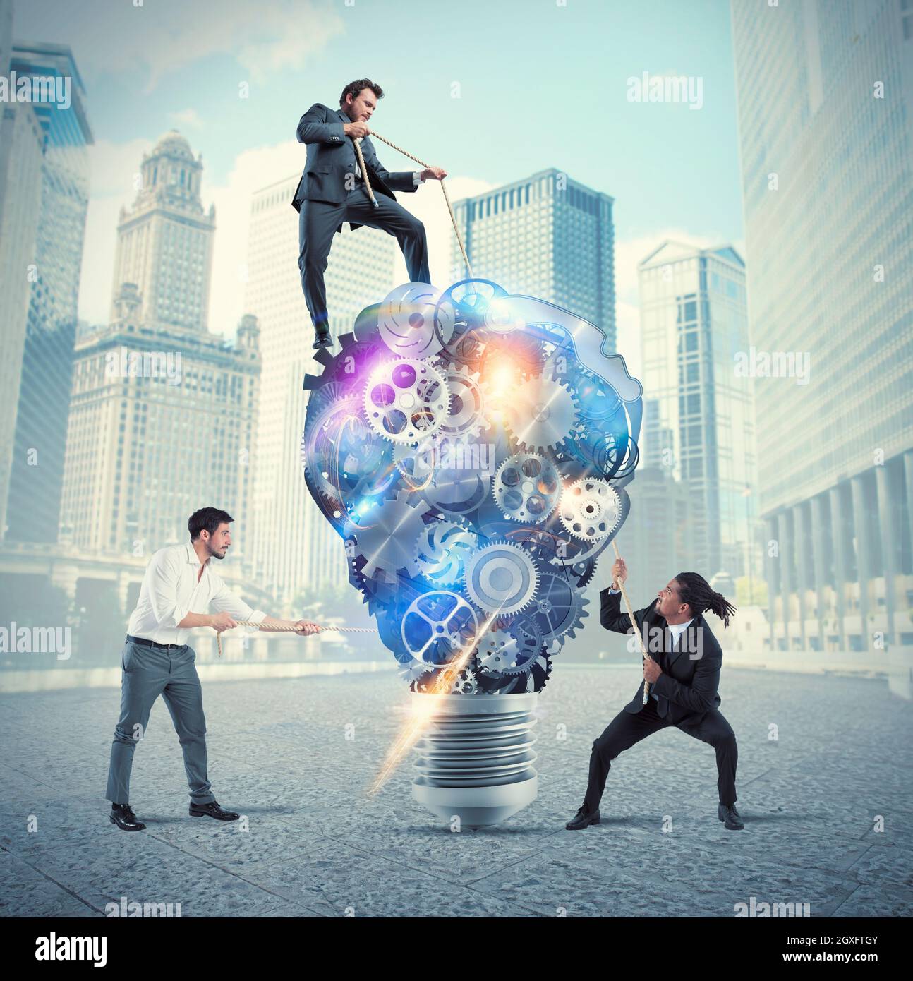 Teamwork of businesspeople work together to a lightbulb system of gears ...