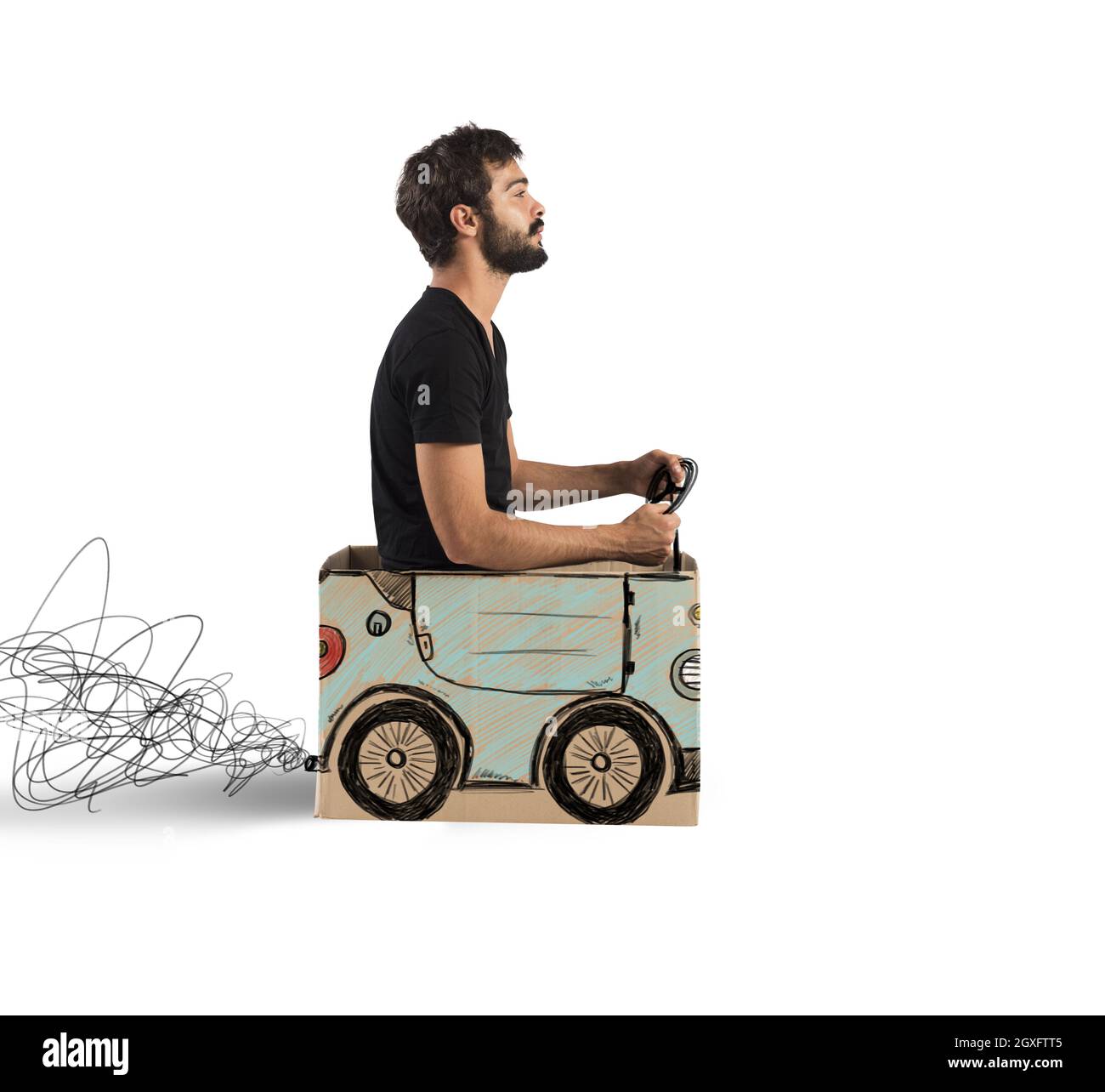 Boy driving a fake designed cardboard car Stock Photo - Alamy