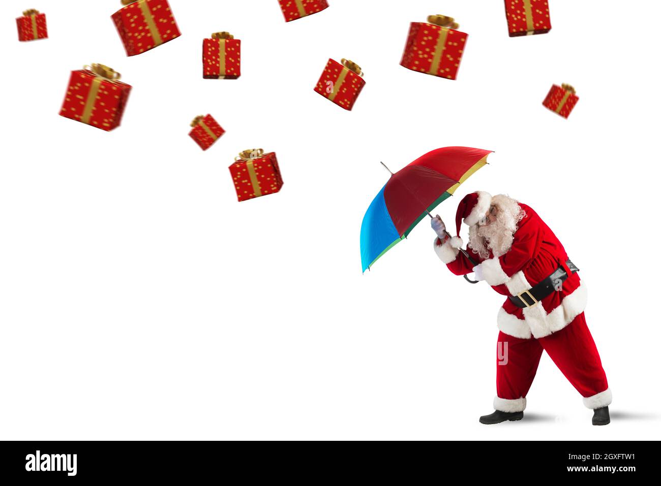 Santa claus is protected by gifts with umbrella Stock Photo - Alamy