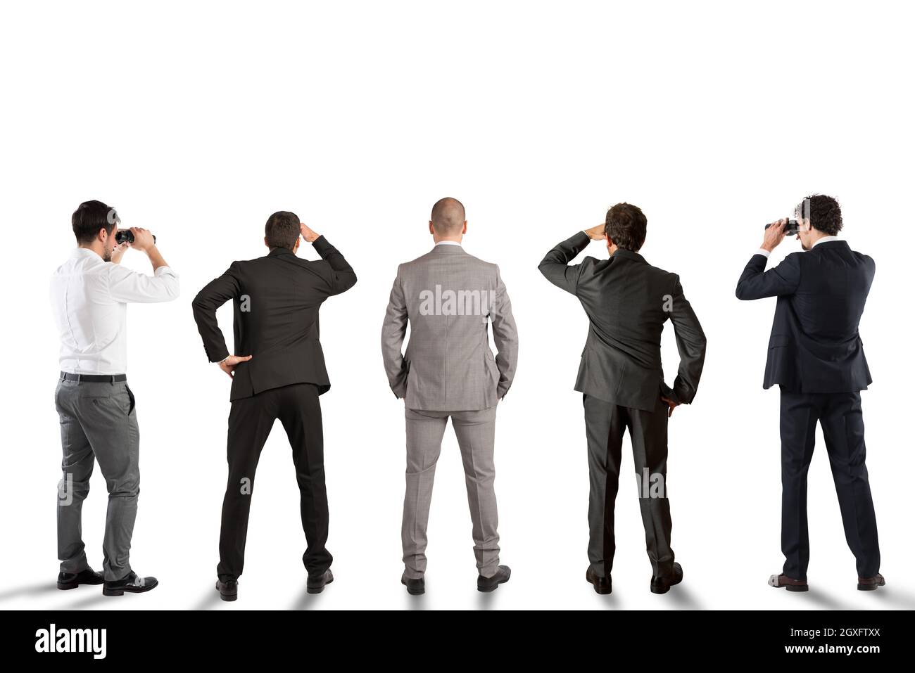Businessmen carefully look in the same direction Stock Photo - Alamy