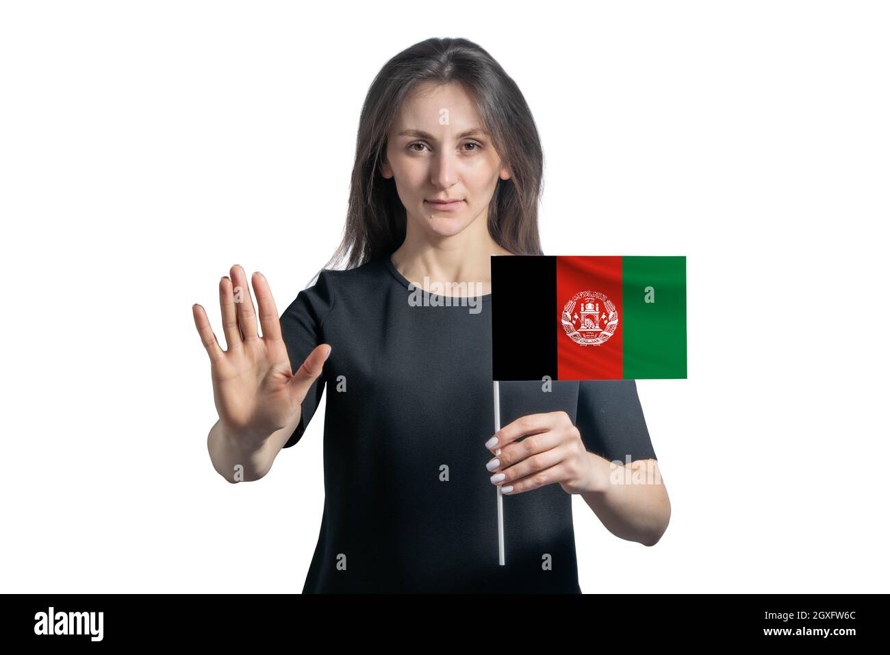 Happy young white woman holding flag of Afghanistan and with a serious ...