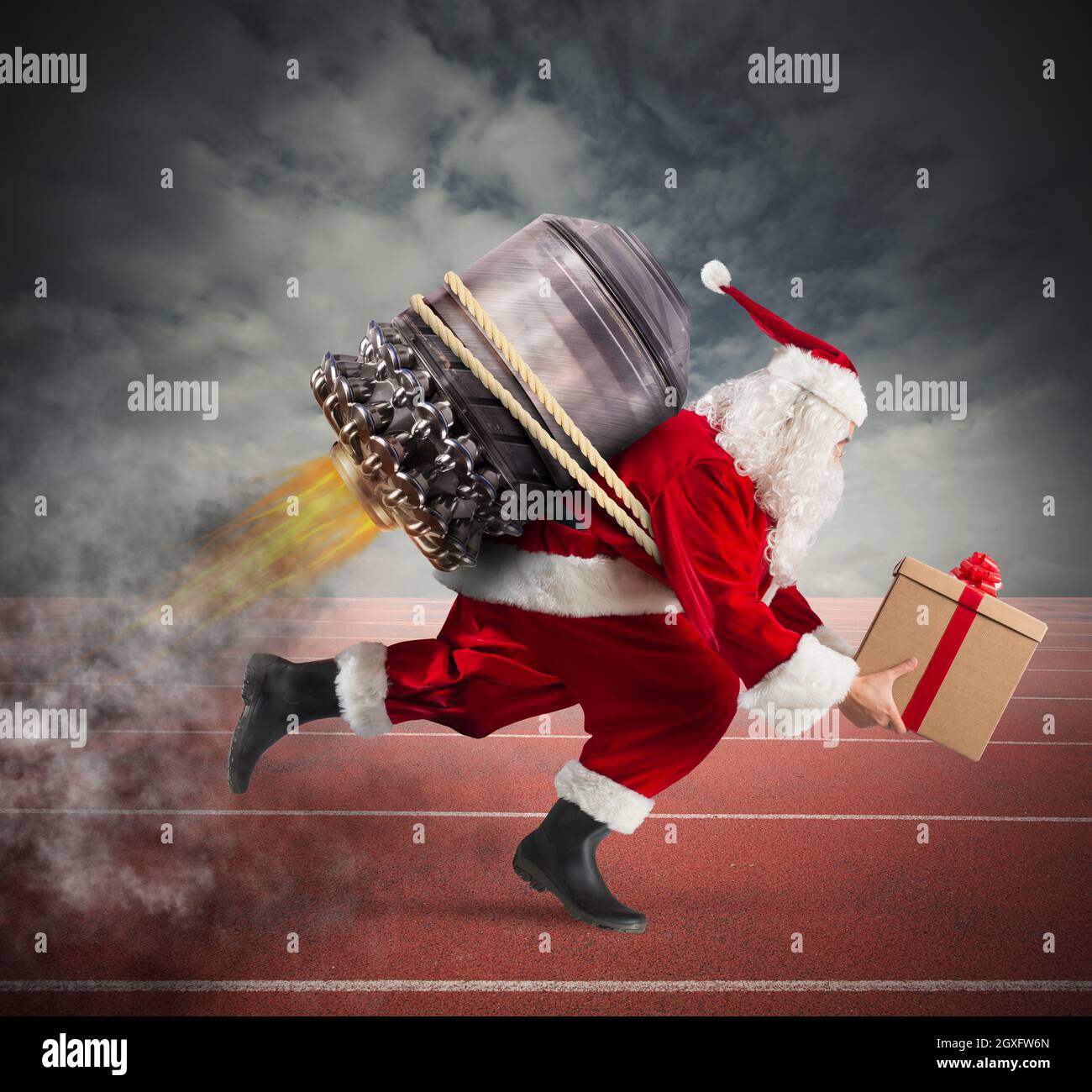 Santa Claus with gift box runs with a missile in a track Stock Photo ...