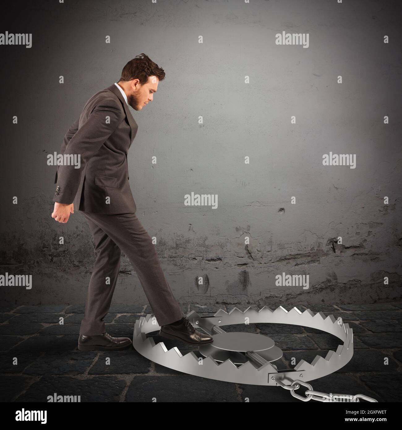 Man puts his leg in a trap Stock Photo - Alamy