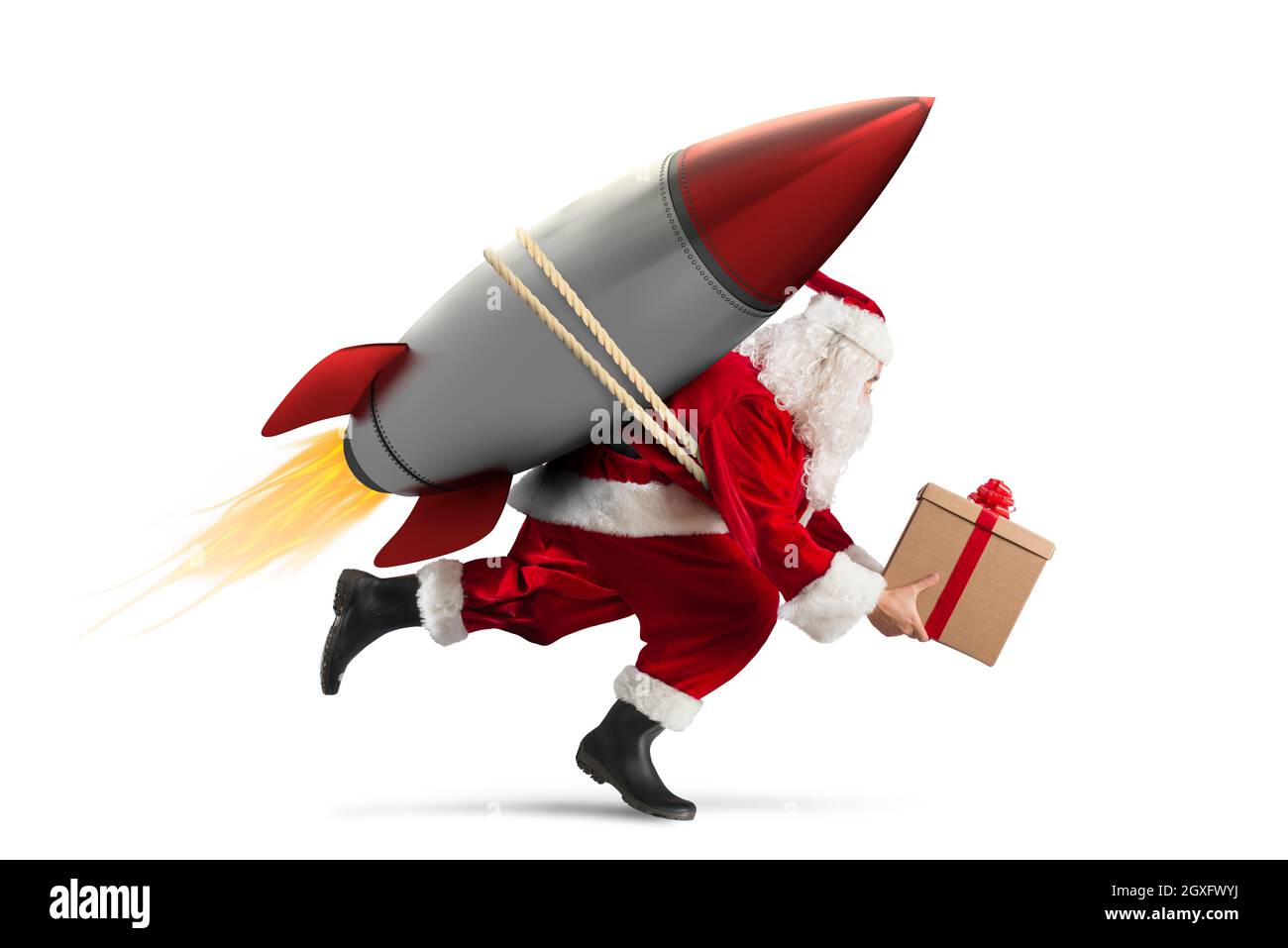 Santa Claus with gift box ready to fly with a rocket in the sky ...
