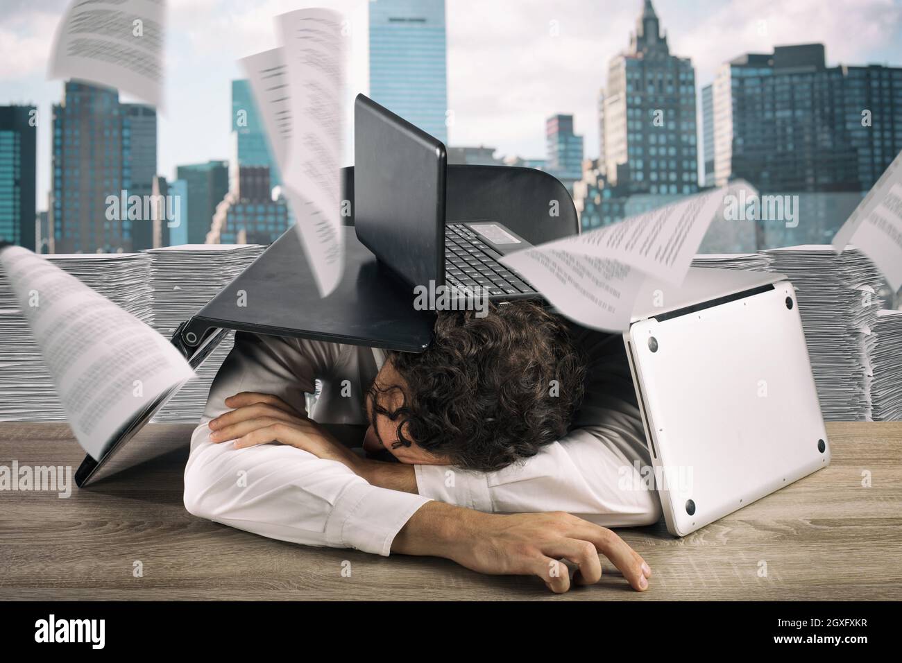Man buried in paperwork hi-res stock photography and images - Alamy