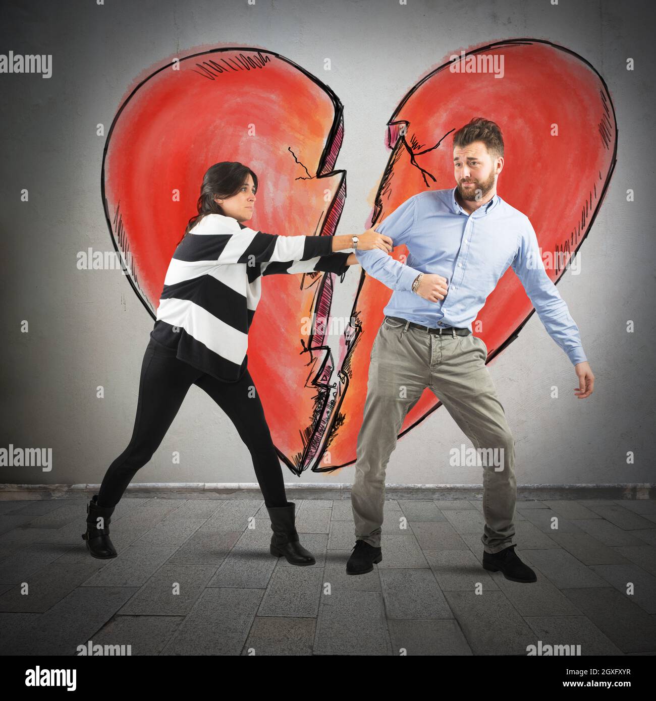 Couple arguing on background a broken heart Stock Photo - Alamy
