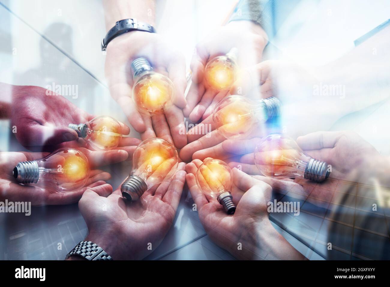 Agreement between business people with light effects Stock Photo - Alamy