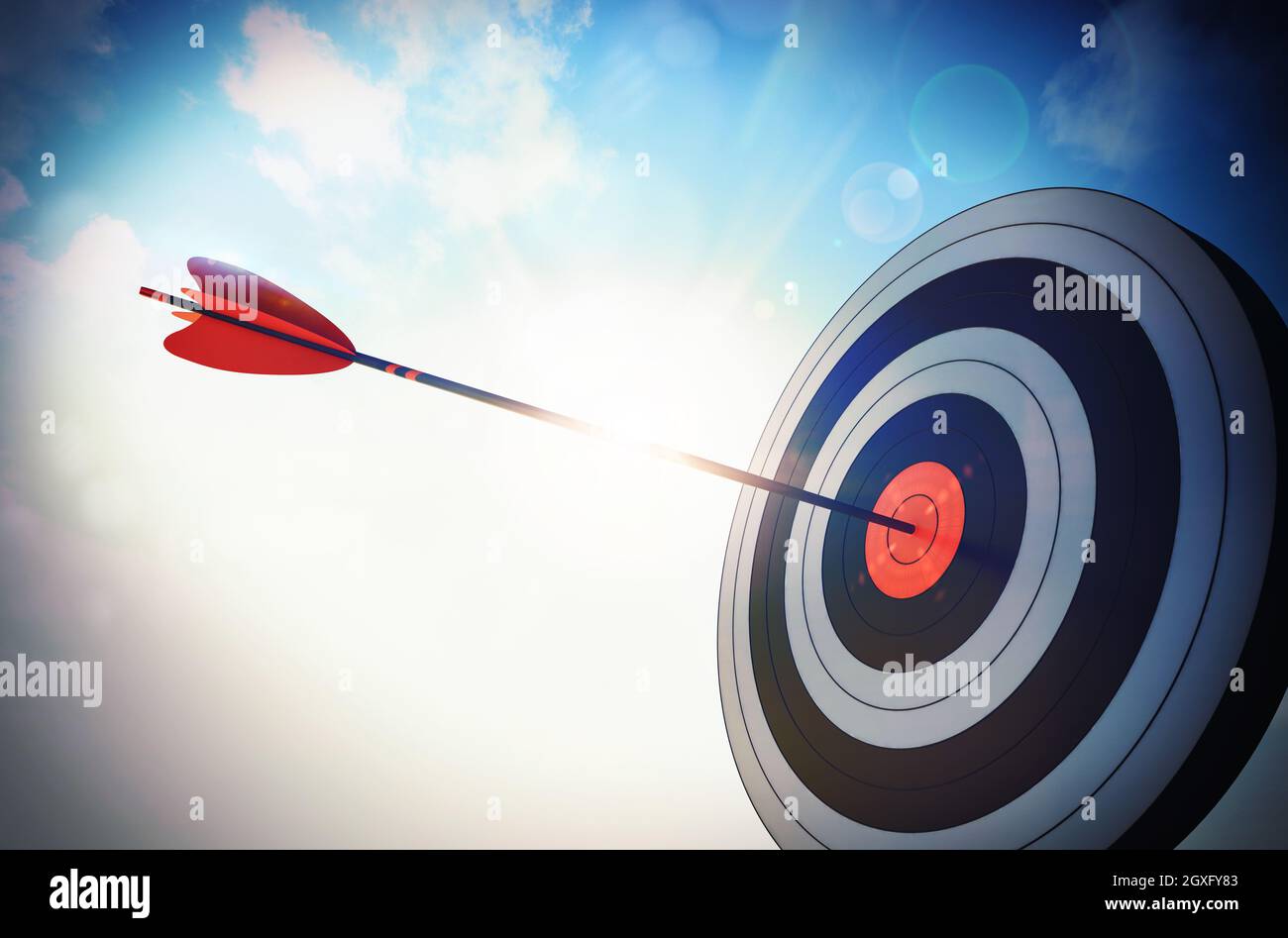 Target hit in the middle by arrow Stock Photo - Alamy